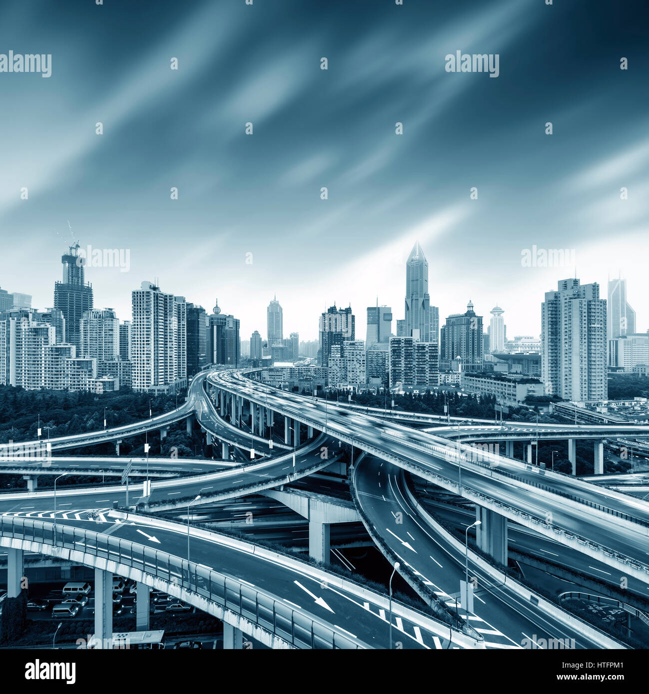 Freeway in night with cars light in modern city Stock Photo - Alamy