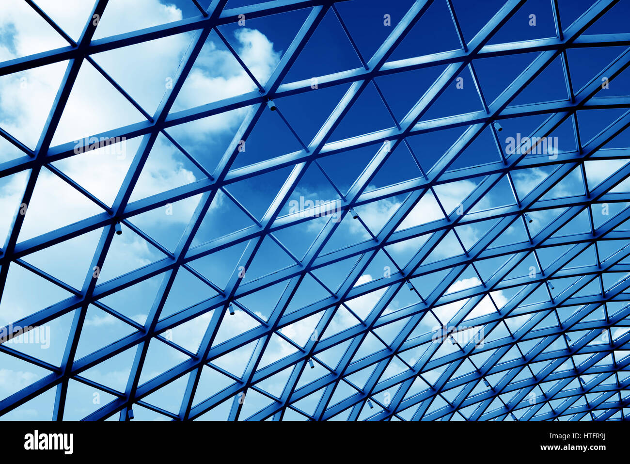 Transparent glass ceiling subway station Stock Photo - Alamy