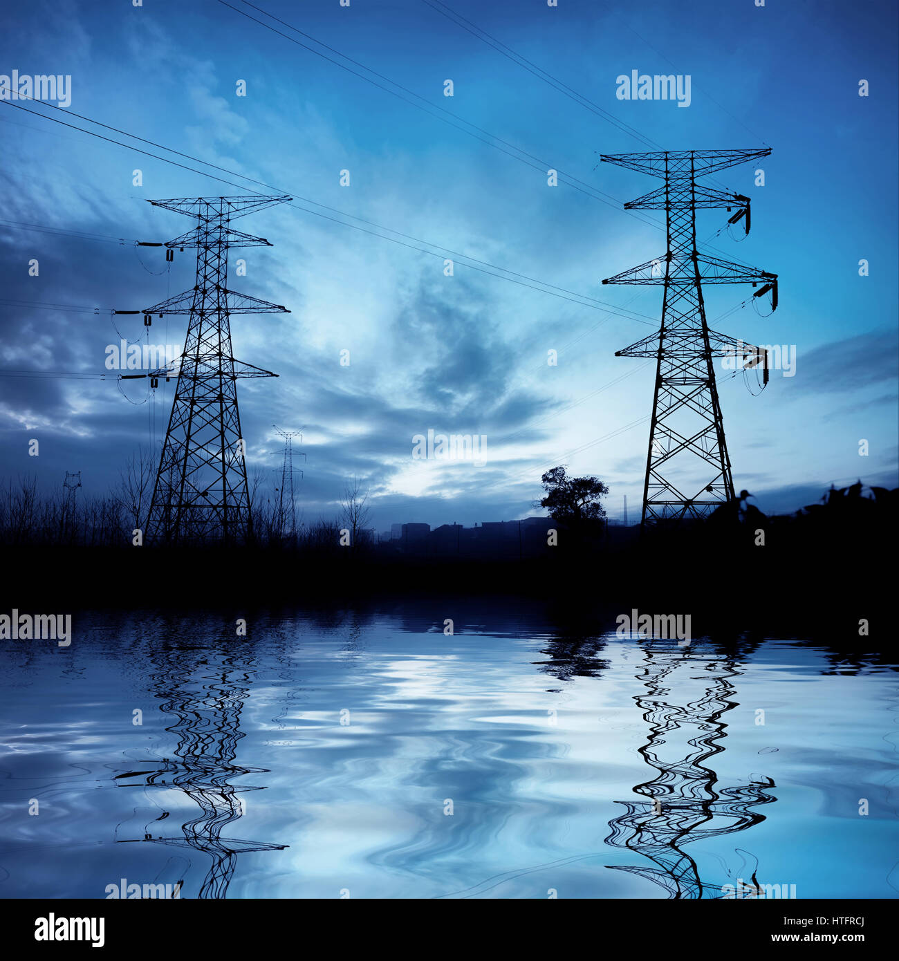 Pylons under the night sky background Stock Photo - Alamy