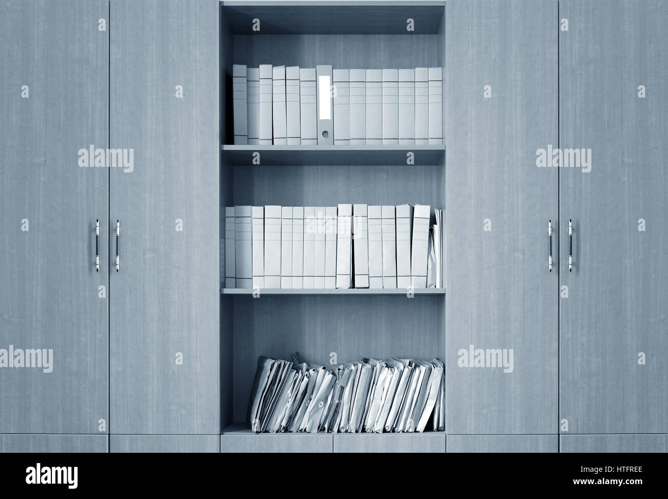 file folders, standing on the shelves in the background Stock Photo - Alamy
