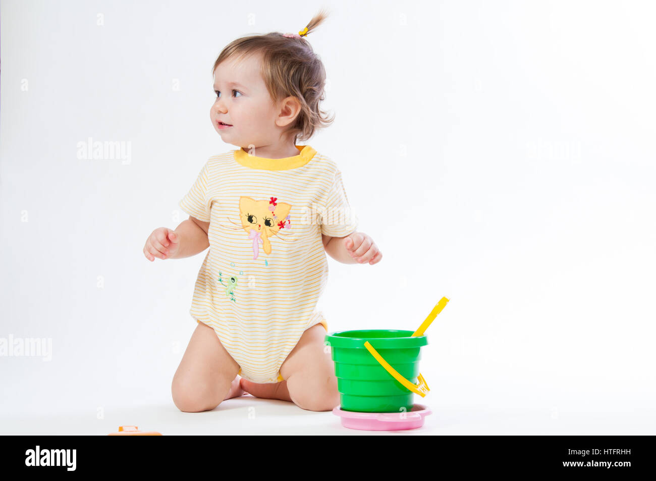 Cute baby with bucket and spade isolated on white background Stock ...