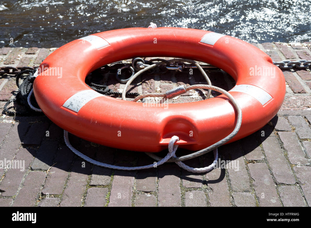 life preserver on wharf Stock Photo - Alamy
