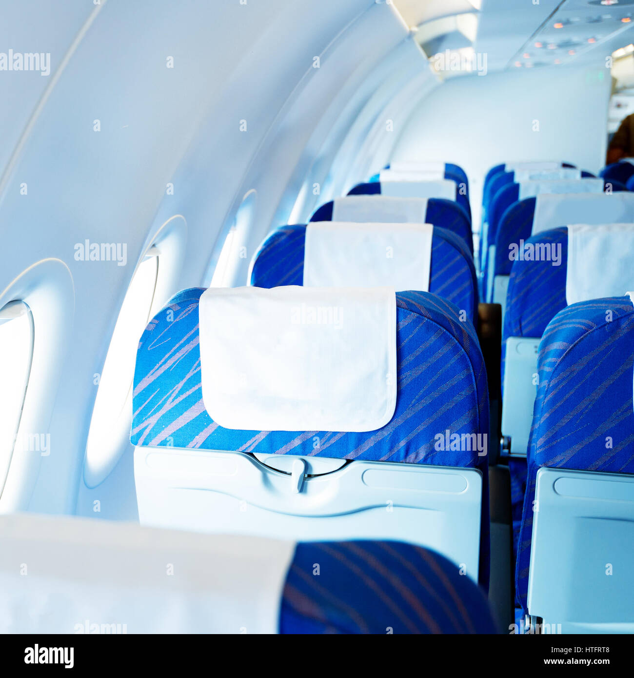 Empty aircraft seats and windows Stock Photo - Alamy