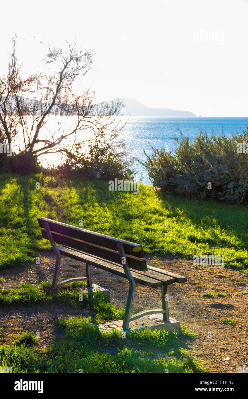 Lone bench in Tuscany on a cliff facing the sea in winter Stock Photo ...