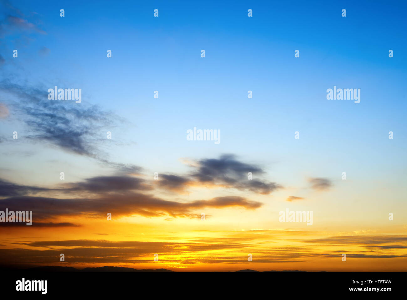 Sunset / sunrise with clouds, light rays and other atmospheric effect ...