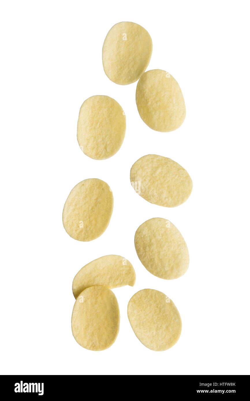 Falling potato chips on white background Stock Photo - Alamy