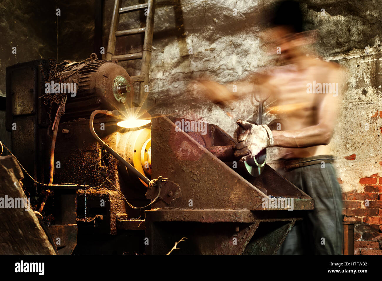 Old machine, workers are working Stock Photo - Alamy