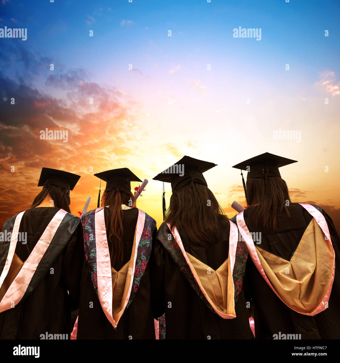Happy graduates blue hi-res stock photography and images - Alamy