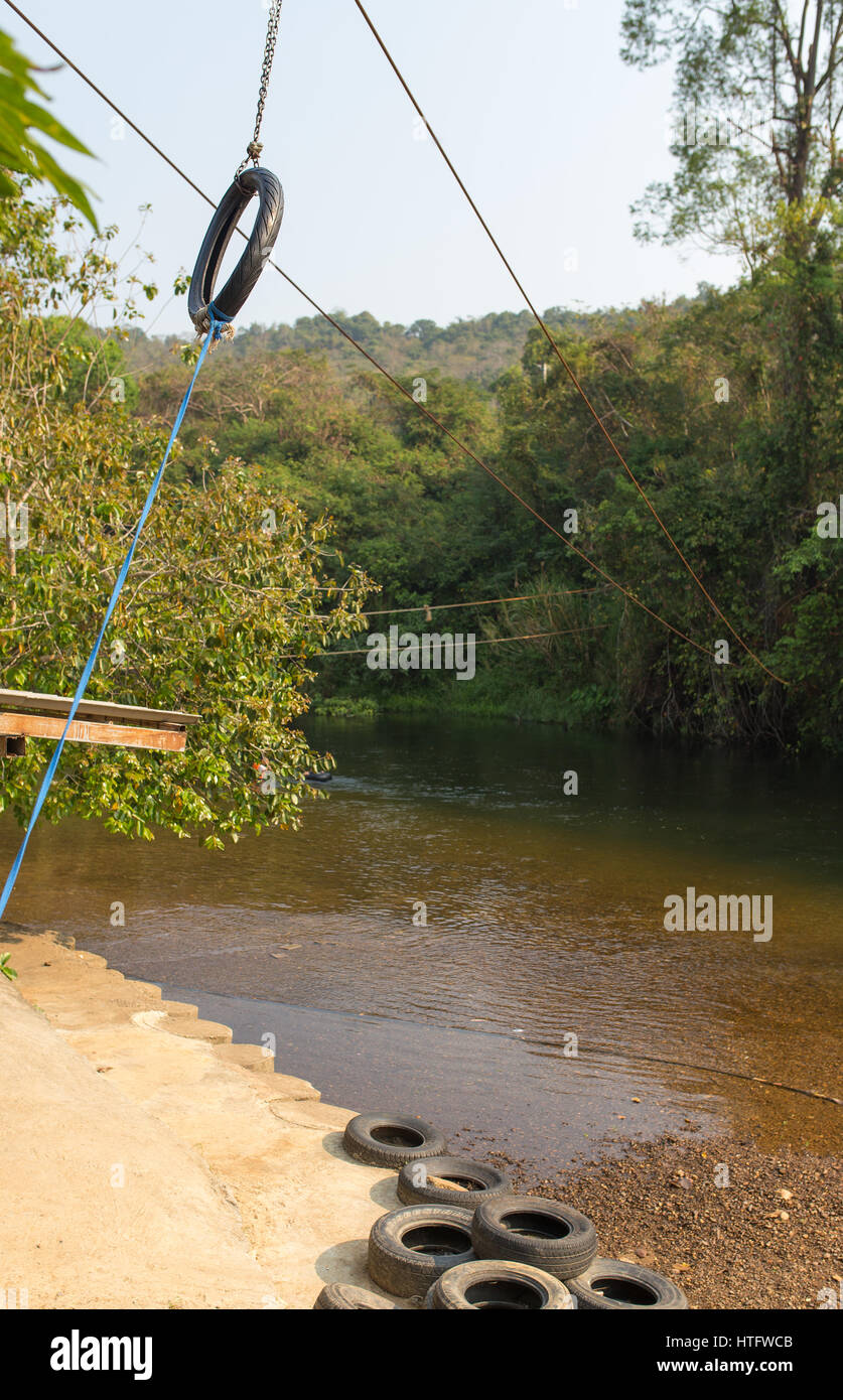 Sliding zip line in an adventure park , Thailand Stock Photo - Alamy