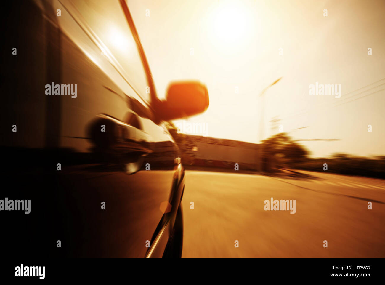 A car driving on a motorway at high speeds, overtaking other cars Stock ...