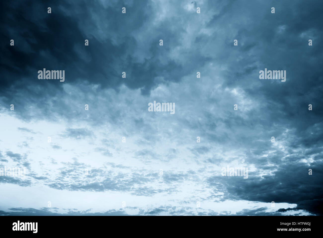 Background of dark clouds before a thunder-storm Stock Photo - Alamy