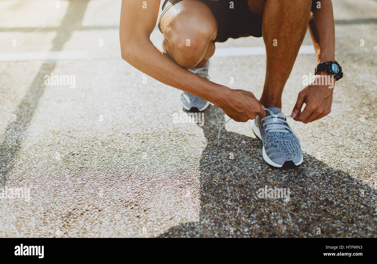 Runner trying running shoes getting ready for run. Healthy lifestyle ...