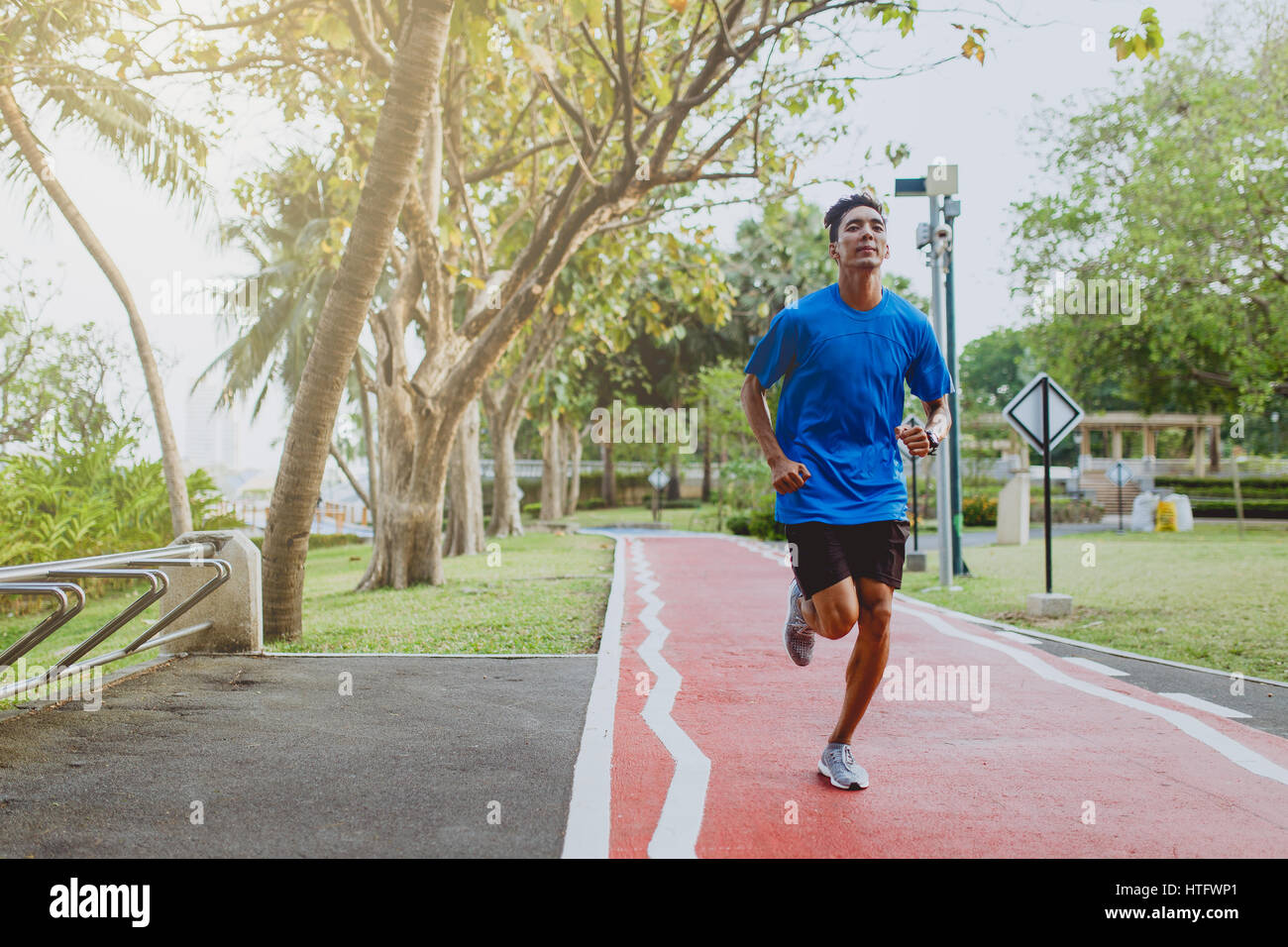 Athletic man running in the public park , Healthy lifestyle Stock Photo ...