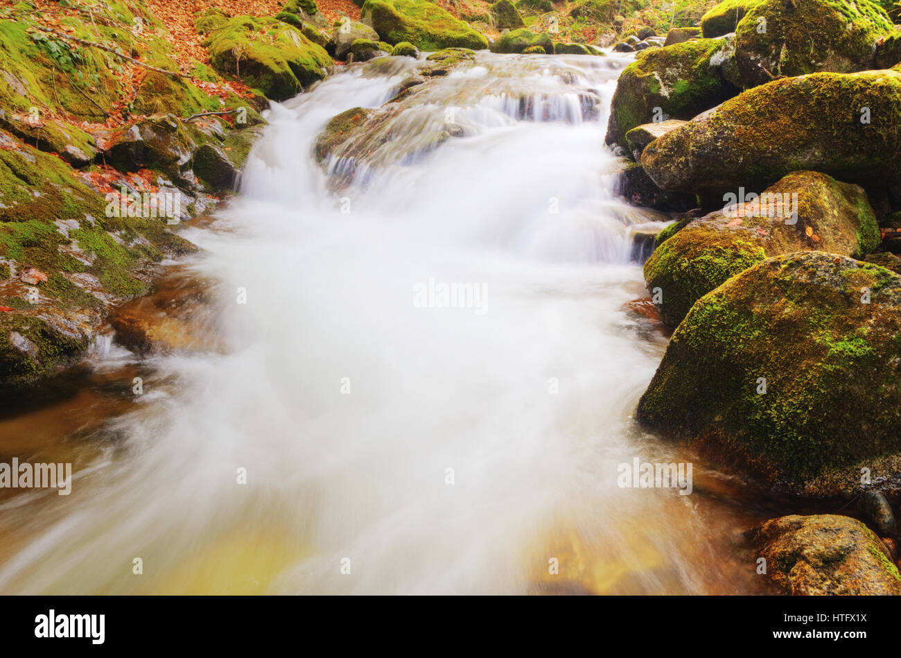 Beautiful mountain waterfall Stock Photo - Alamy