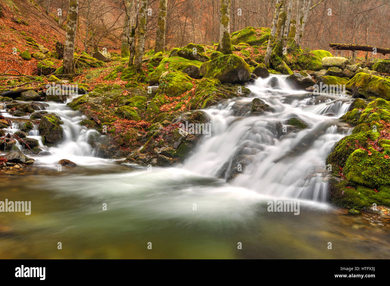 Beautiful mountain waterfall Stock Photo - Alamy