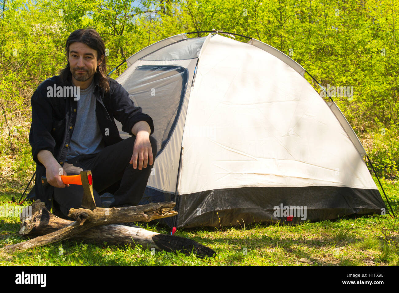 Man camping survival wood tent hi-res stock photography and images - Alamy