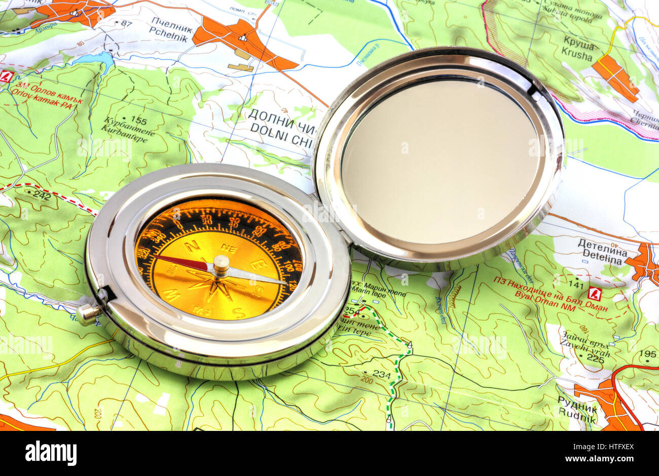 Compass over the map Stock Photo - Alamy