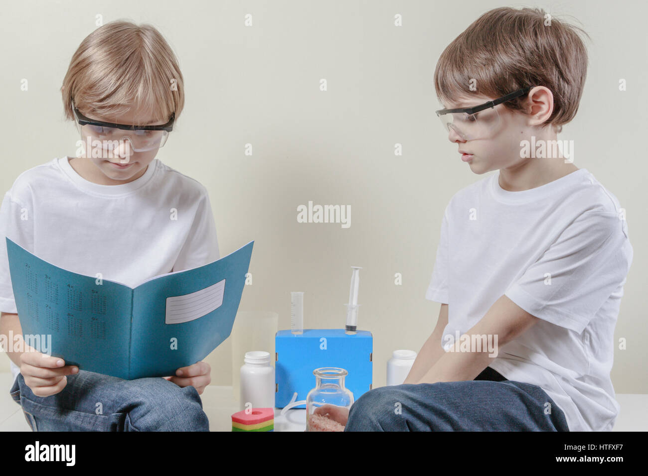 Children preparing to make science experiments. Education, science ...
