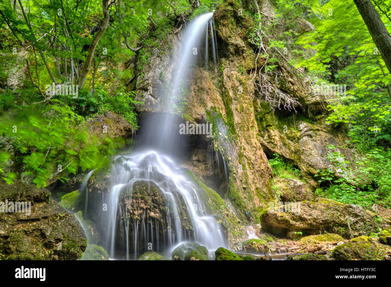 Beautiful mountain waterfall Stock Photo - Alamy