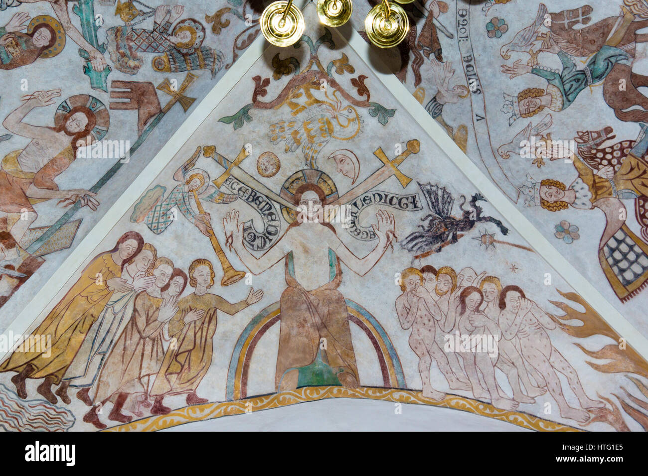 Christ with two swords sitting on the rainbow on judgment day, between ...