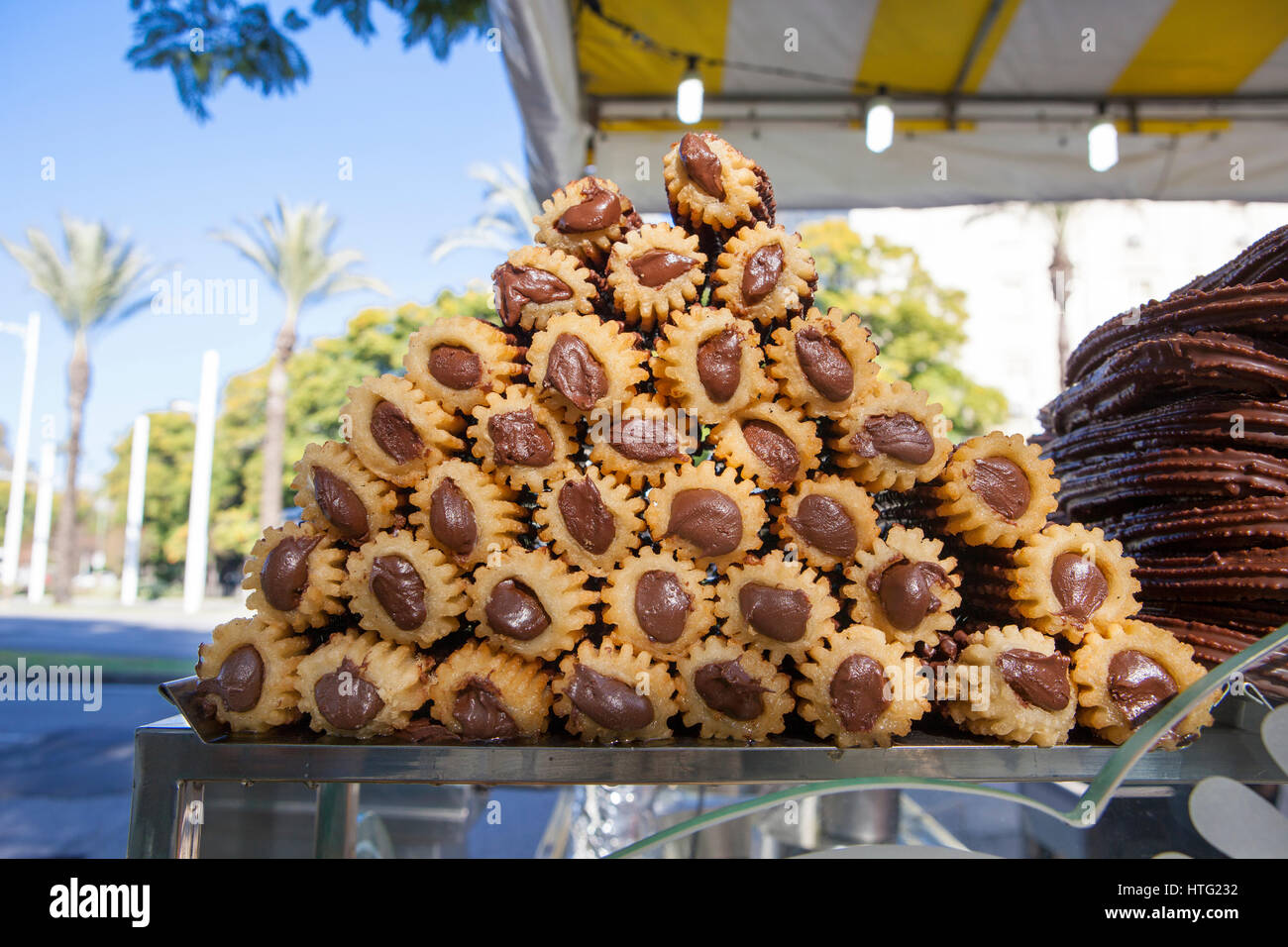 Chocolate filling spanish churros ready to be served at fair stall ...