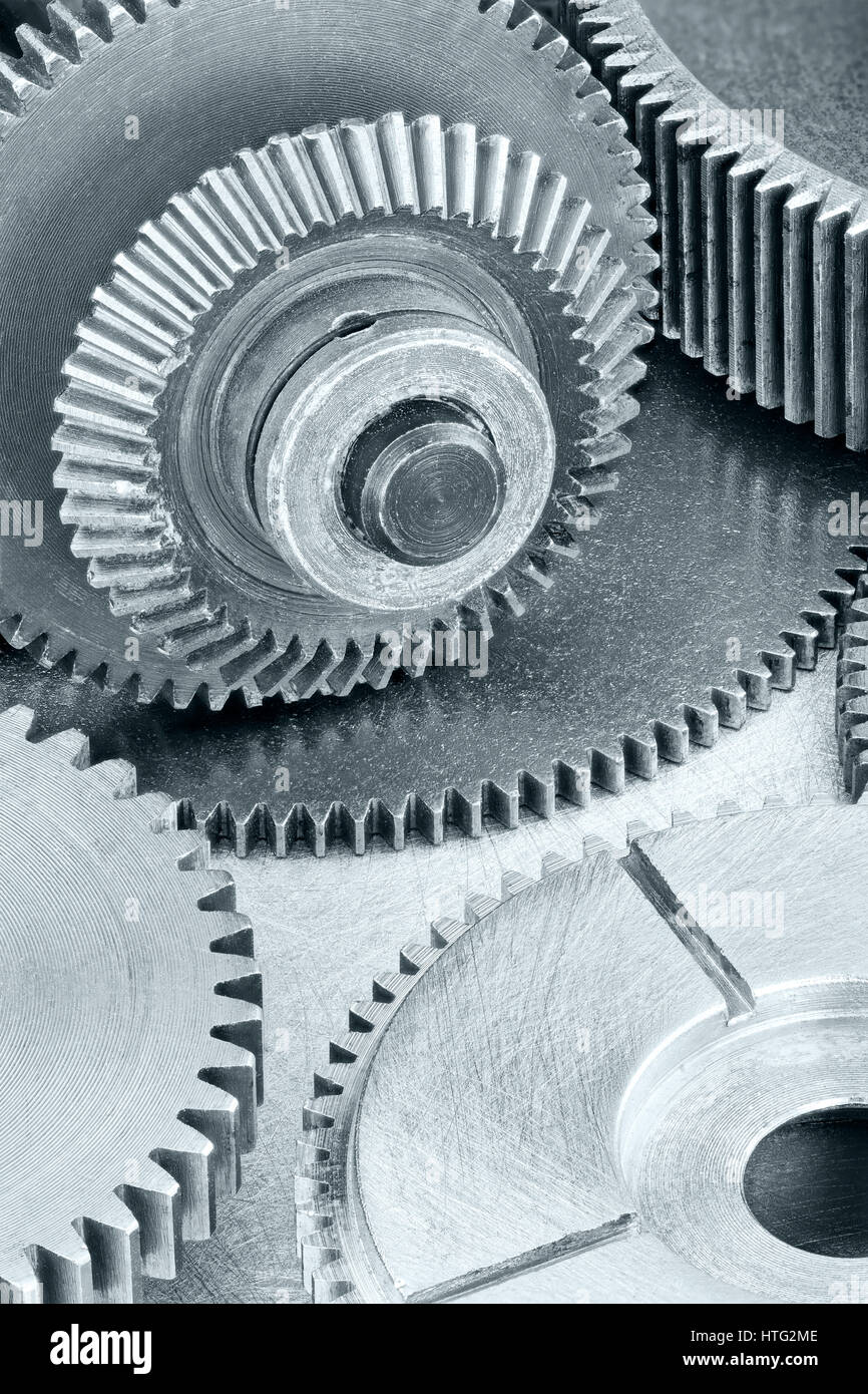 various metal gears for industrial machinery. technology concept ...
