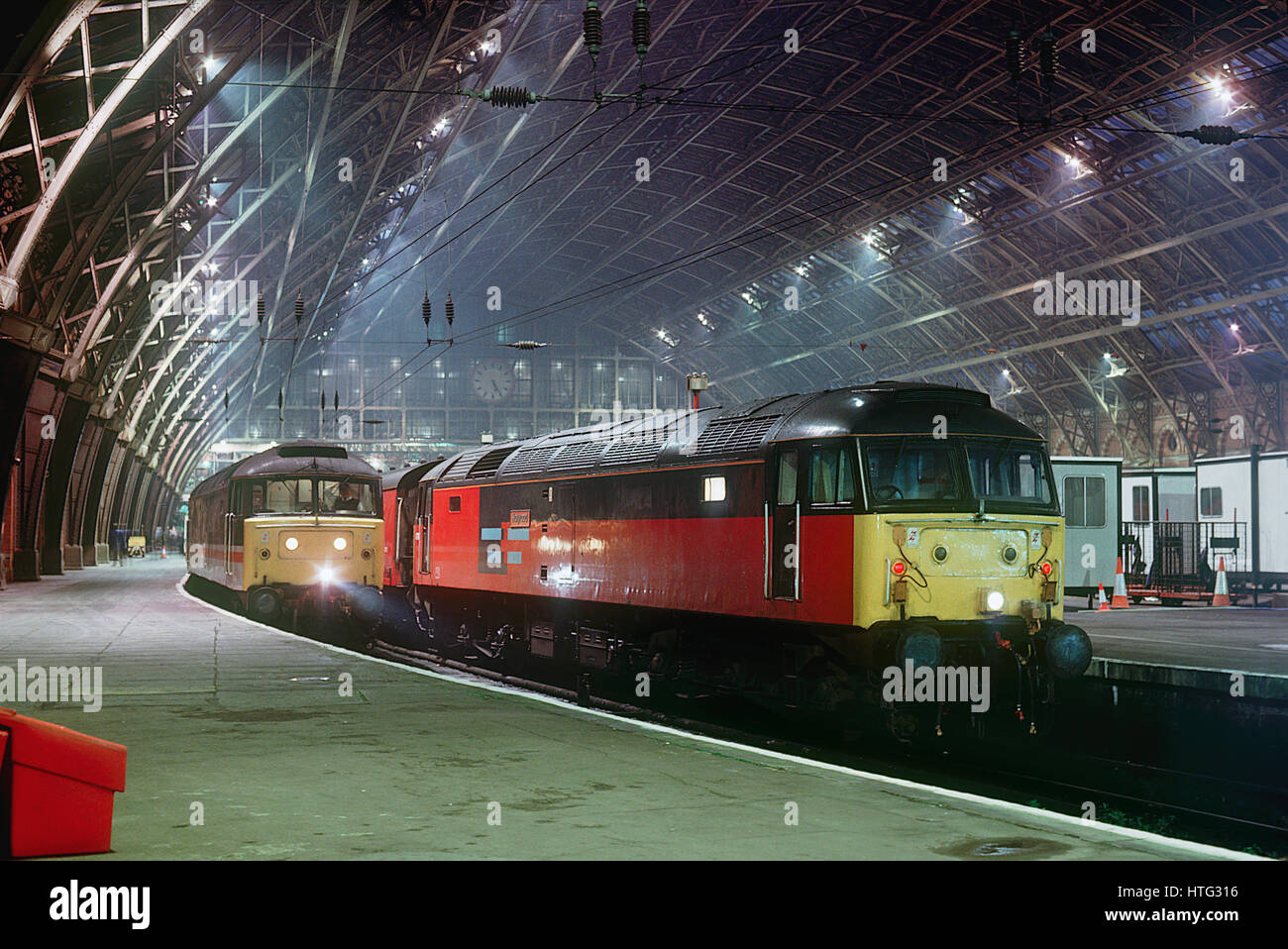 A pair of class 47 locomotives wait to depart London St Pancras railway ...