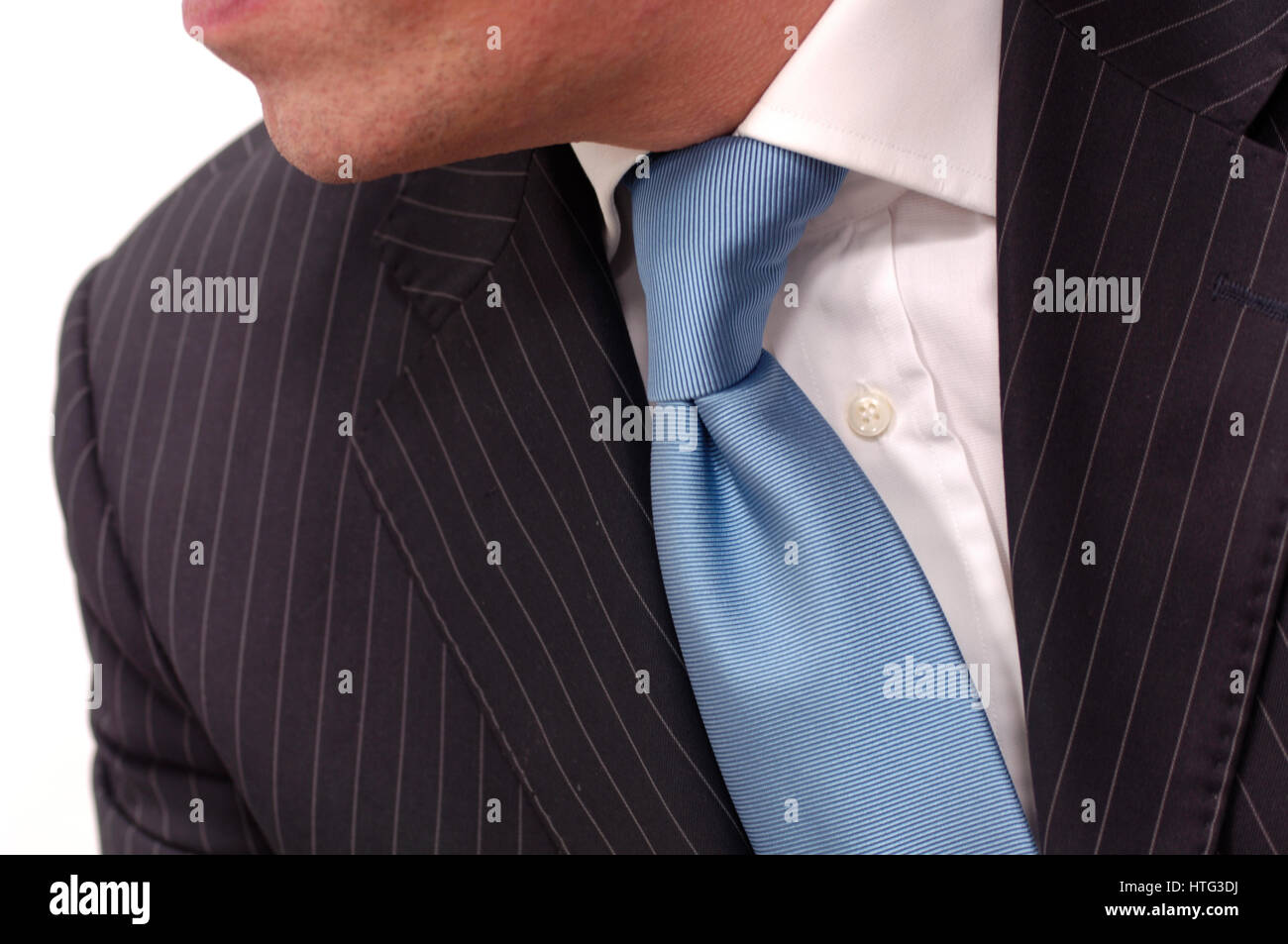 Close up of blue tie around man's neck Stock Photo - Alamy