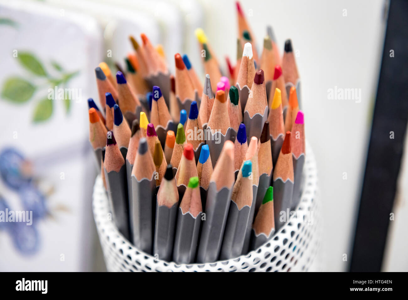 used color pencils in the pencil vase Stock Photo - Alamy