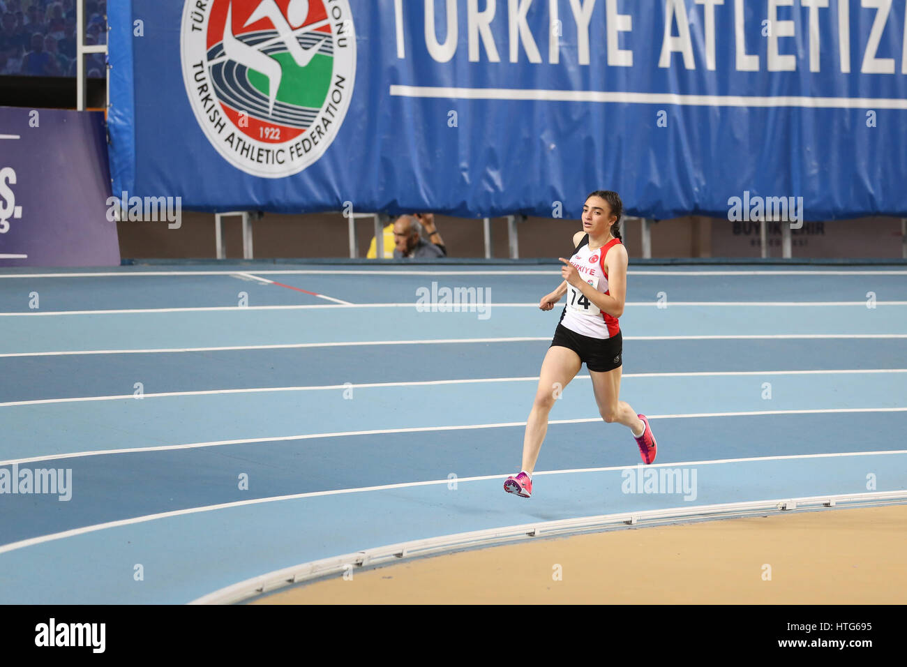ISTANBUL, TURKEY - FEBRUARY 12, 2017: Athlete Tugba Topbas running ...