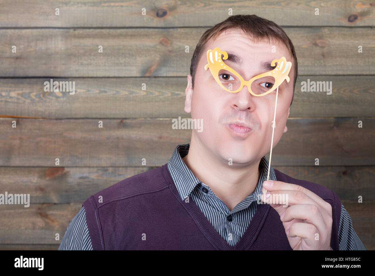 Fake smile stick hi-res stock photography and images - Alamy