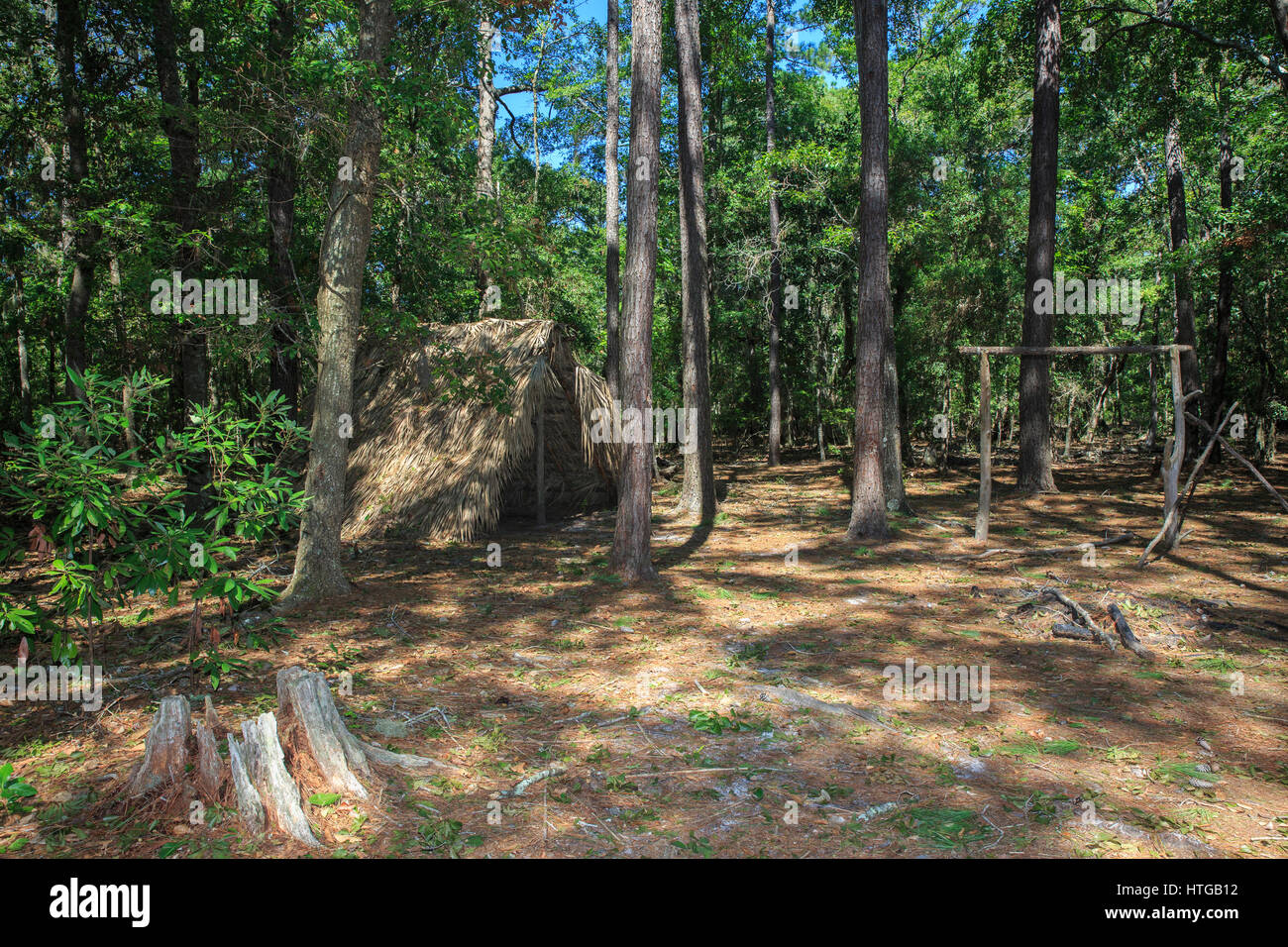 Example of a primitive shelter used as temporary housing until a more ...
