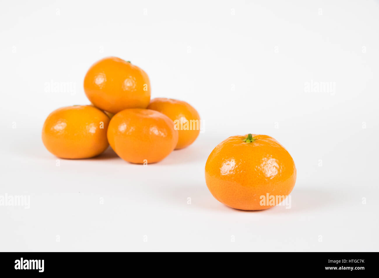 Clementine Separated from Small Pile Isolated on White Stock Photo - Alamy