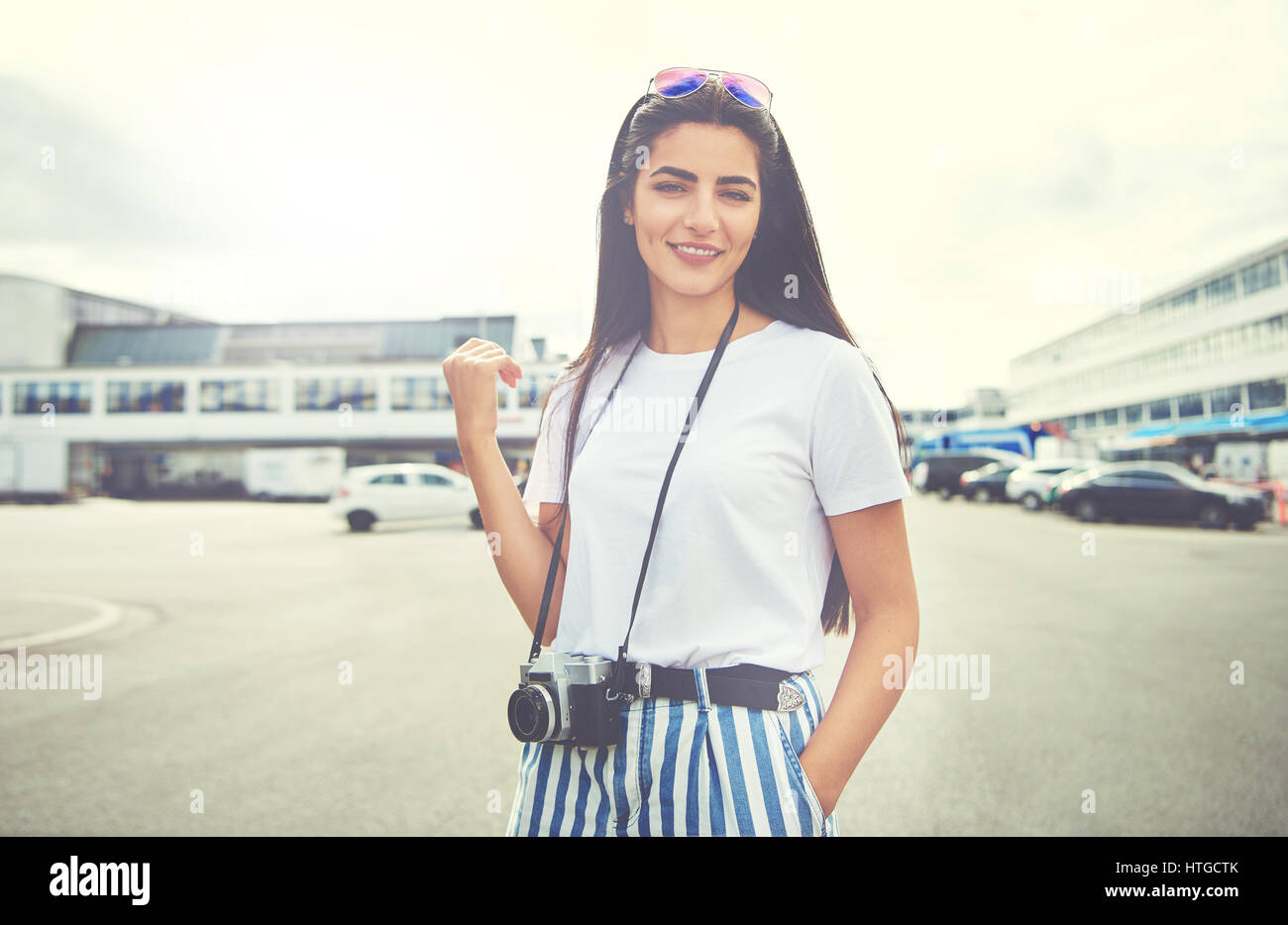 Camera strapped around neck hi-res stock photography and images - Alamy
