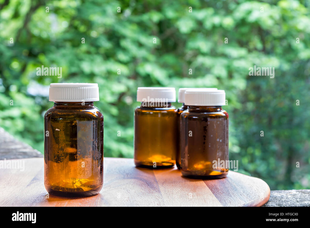 Used glass bottles for recycle Stock Photo - Alamy