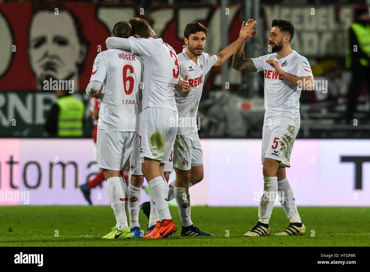 Cologne players celebrate after taking a 2:1 lead during the German ...