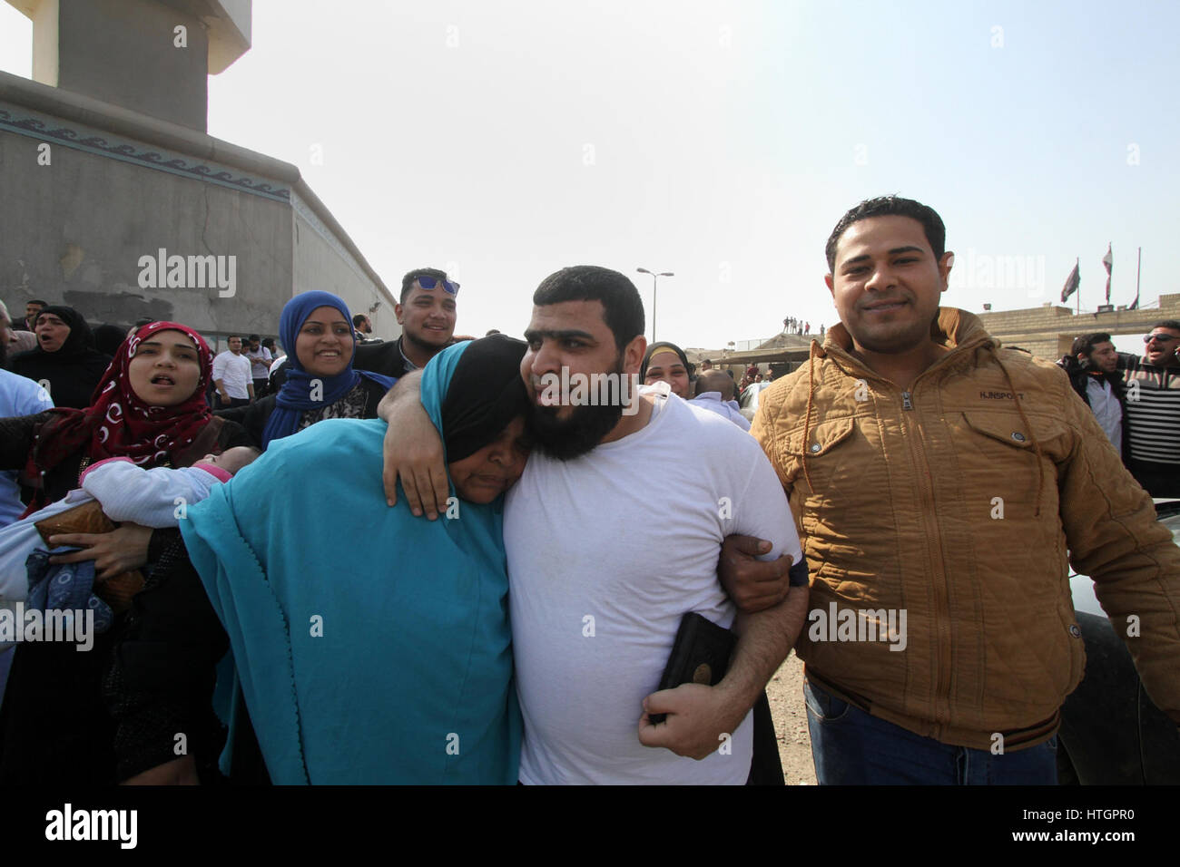 Tora, Cairo, Egypt. 14th Mar, 2017. Released detainees wave to their ...