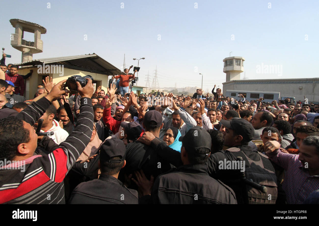 Tora, Cairo, Egypt. 14th Mar, 2017. Released detainees wave to their ...