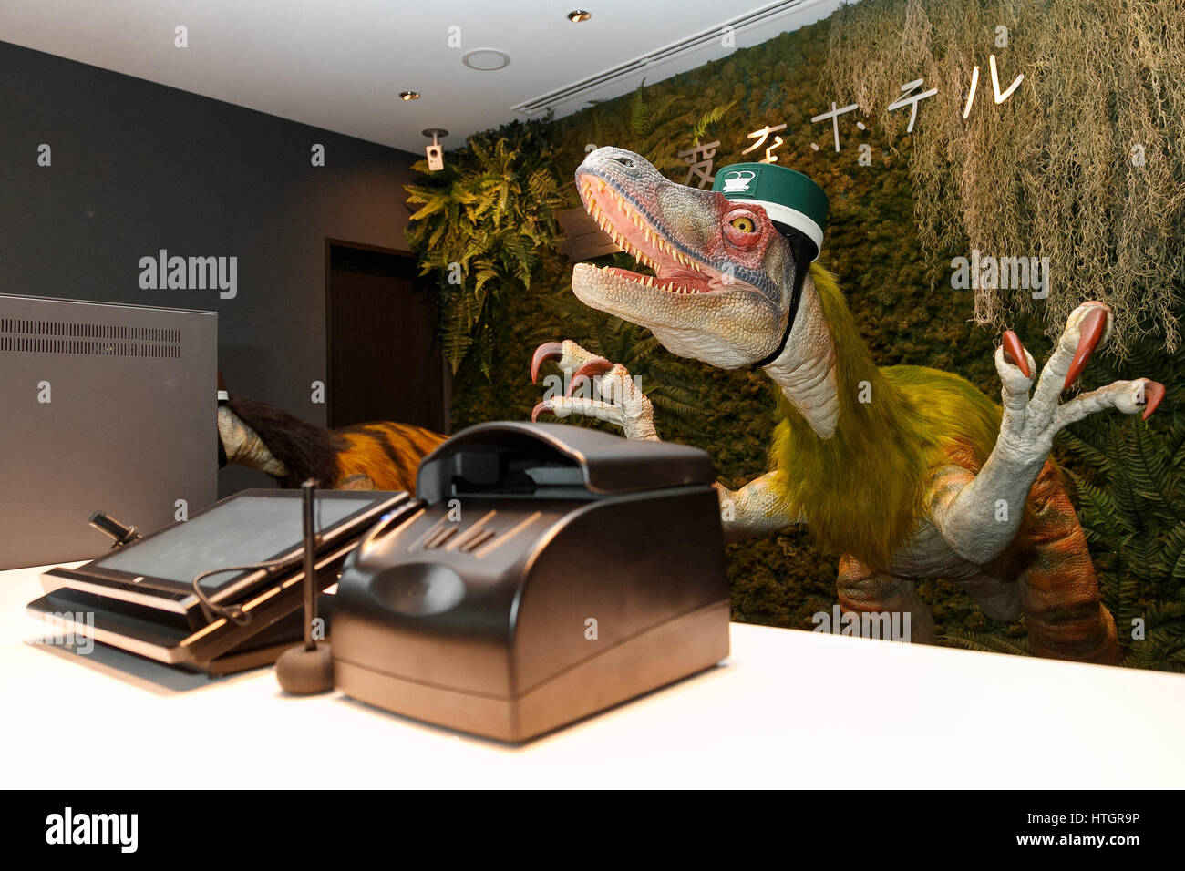 Chiba, Japan. 15th March, 2017. A raptor robot debuts working at the ...