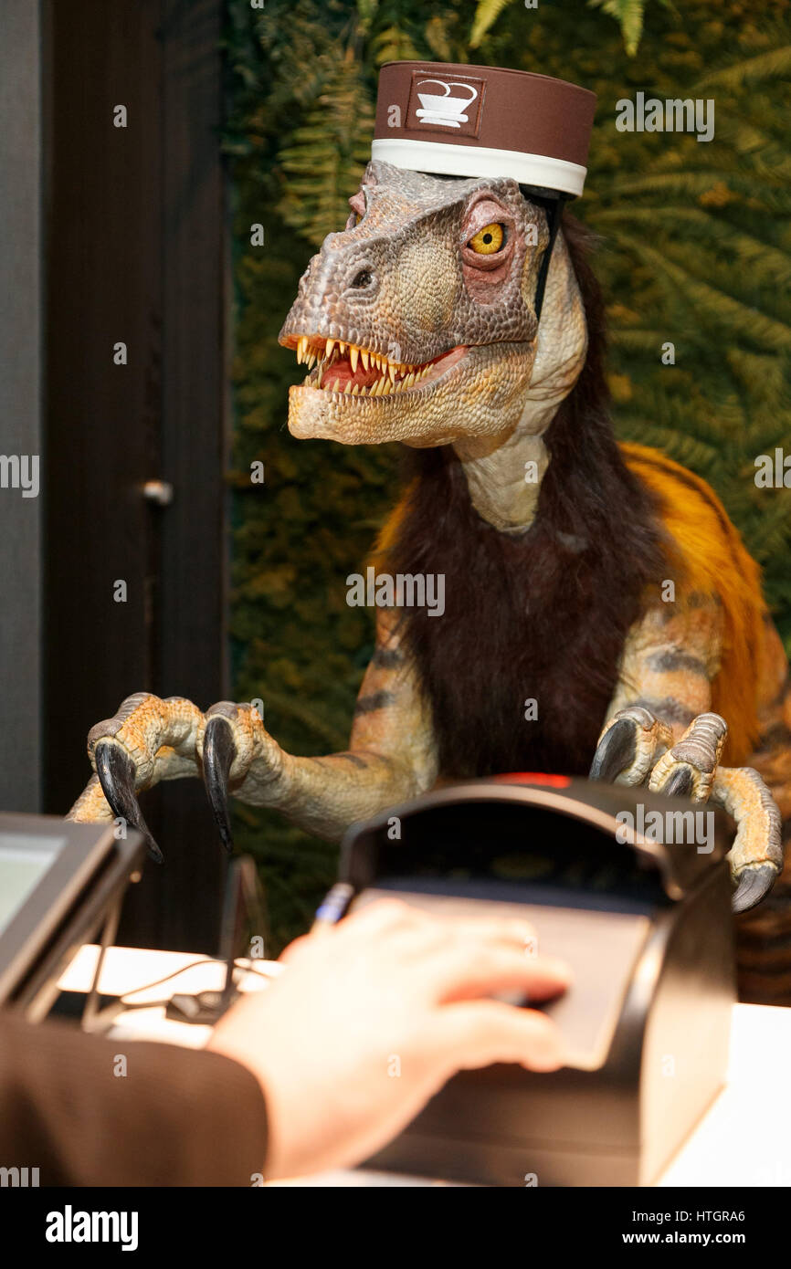 Chiba, Japan. 15th March, 2017. A raptor robot debuts working at the ...