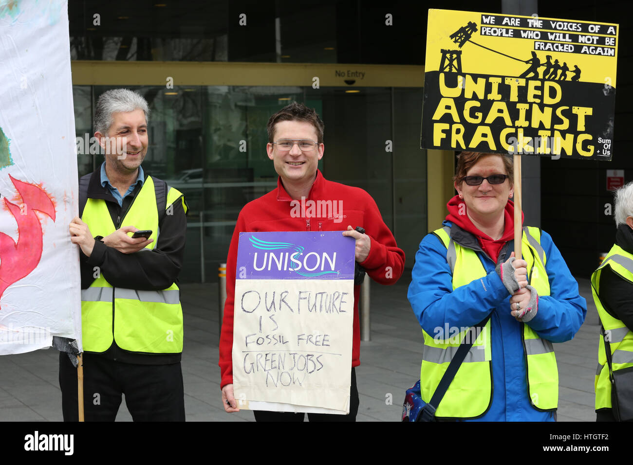 Manchester, UK. 15th March, 2017. Sam O@Brien with a Unison placard ...