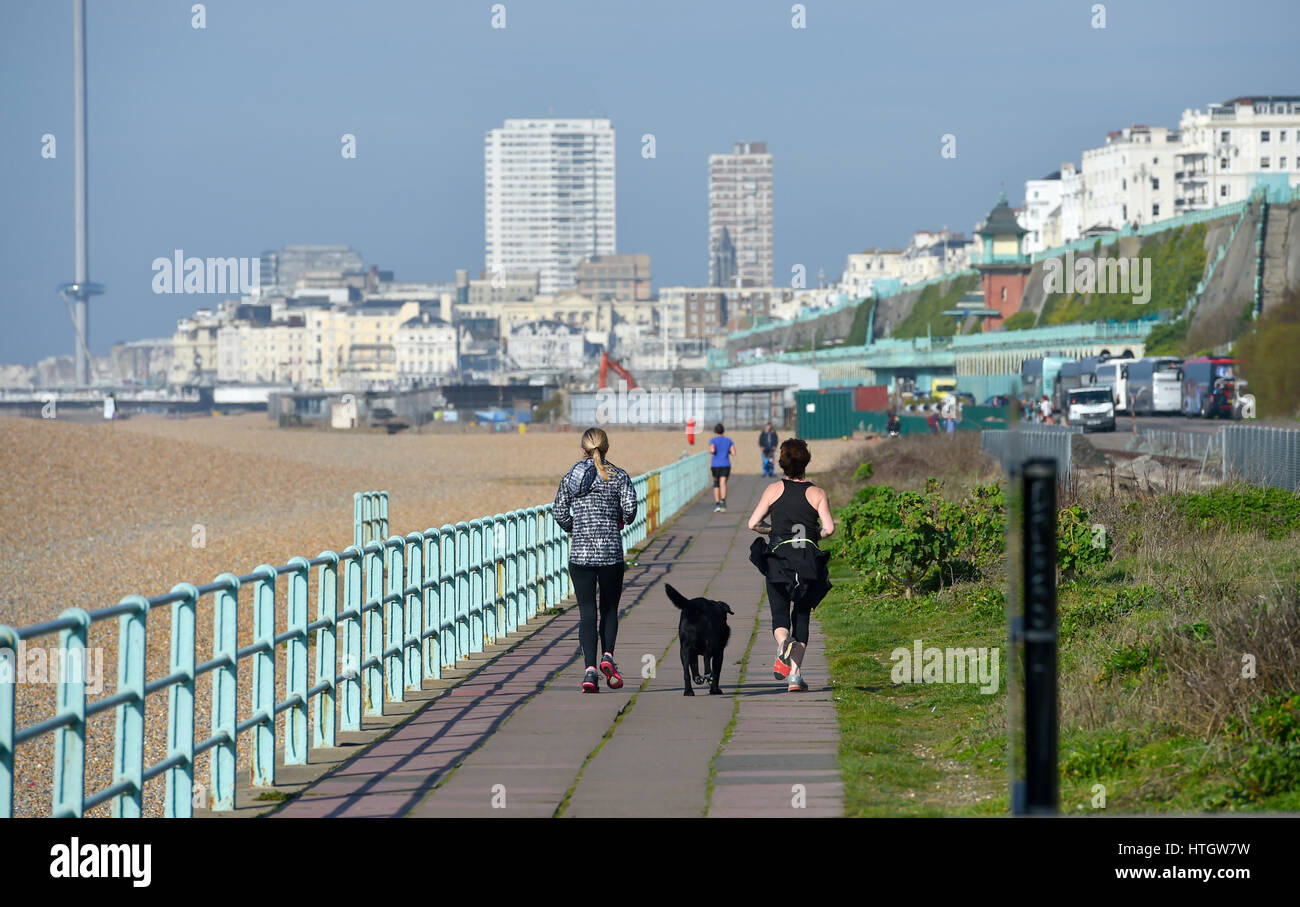 Women enjoy the sunshine in brighton hi-res stock photography and ...