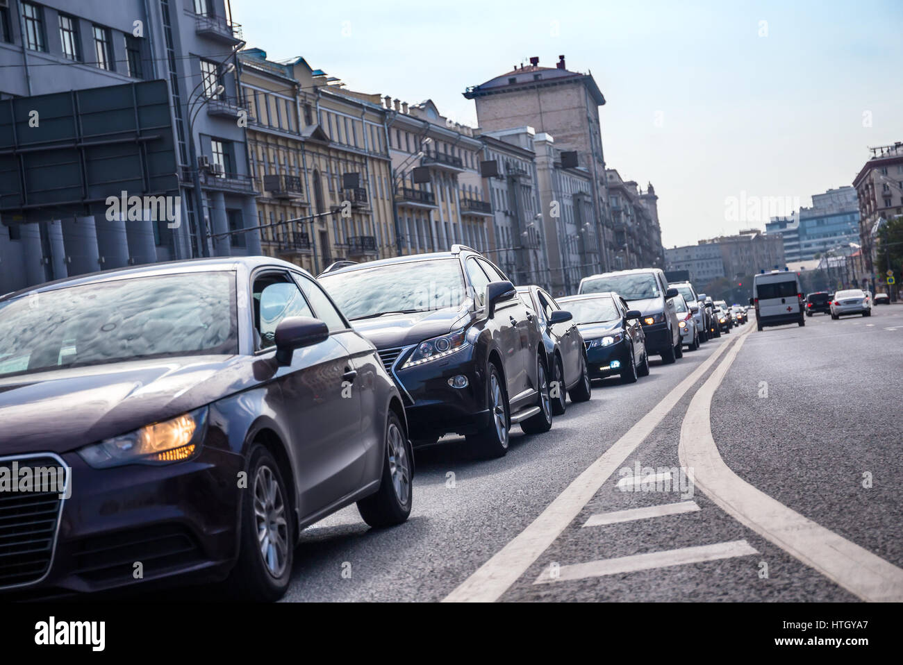 View from below to the lane with cars in traffic jam Stock Photo - Alamy