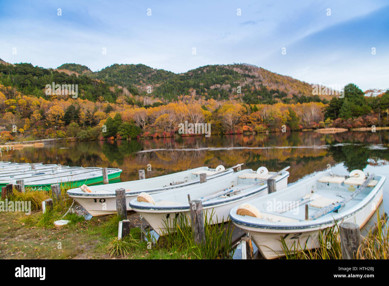 Fishing boat park on lake in evening autumn mountain at Nikko, Tobu ...
