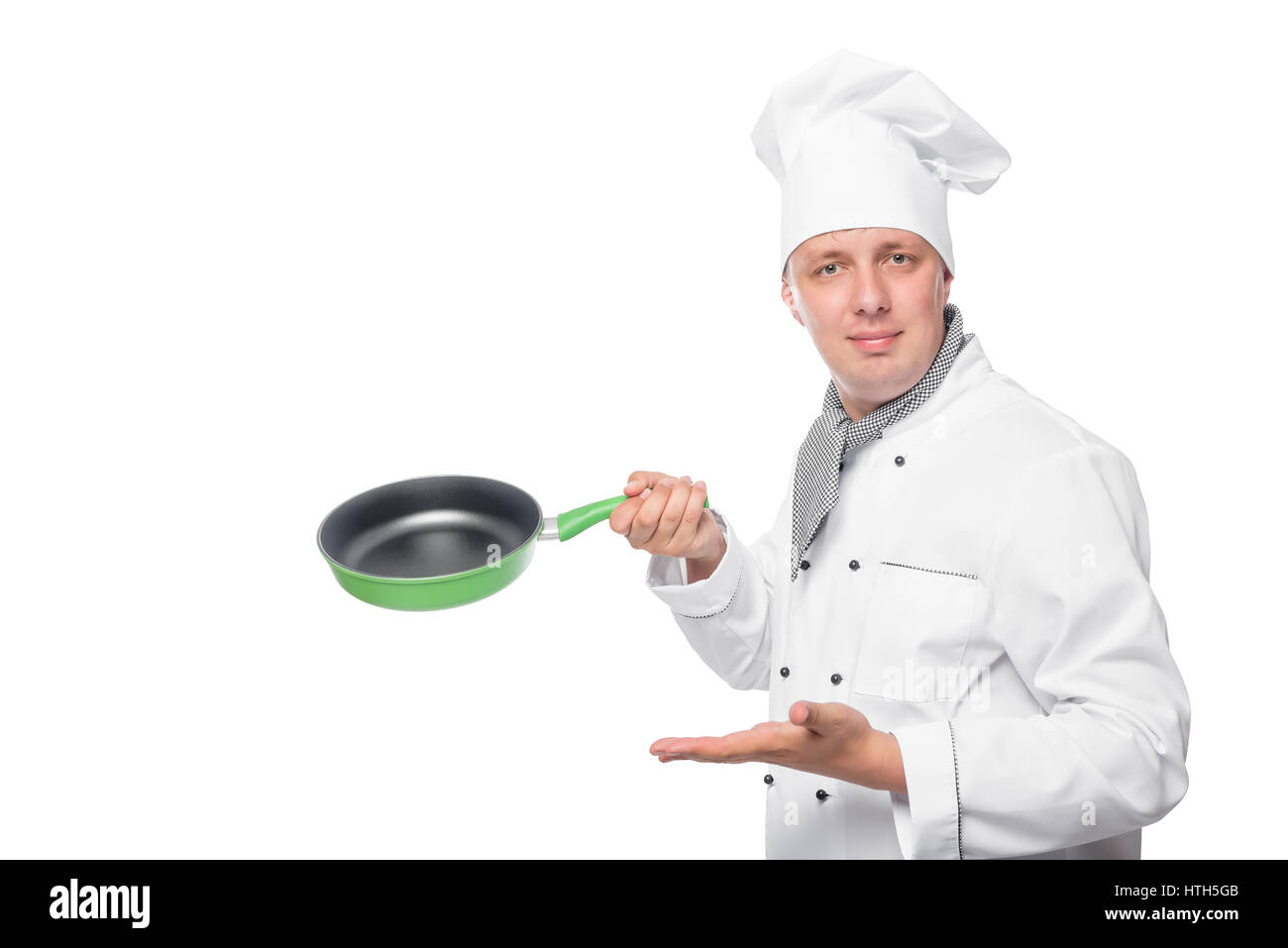 Chef smiling and showing an empty pan on a white background Stock Photo ...