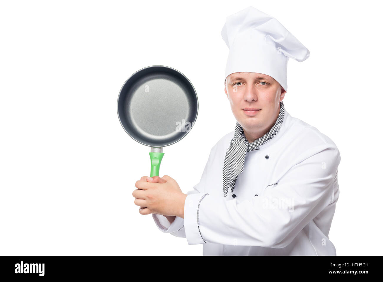 Man holding frying pan Cut Out Stock Images & Pictures - Alamy