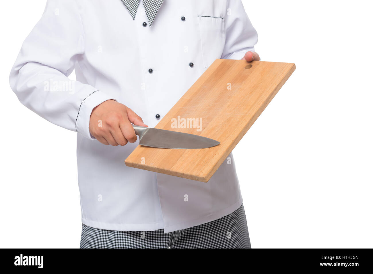 chefs hands with cutting board and a sharp knife close-up Stock Photo ...