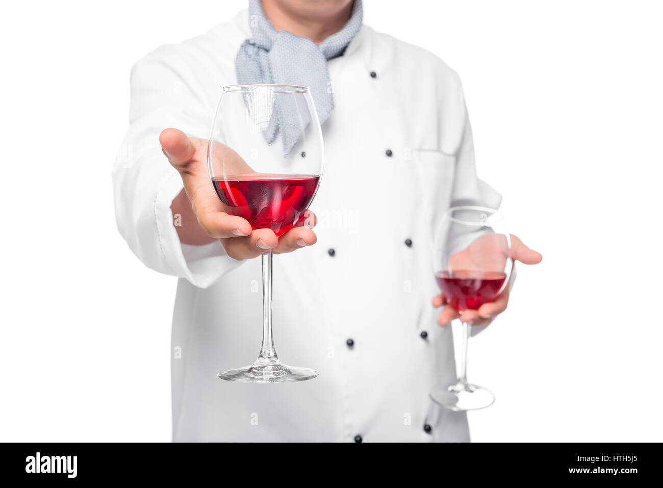 welcome drink for the guests of the restaurant in the focus in the hand ...