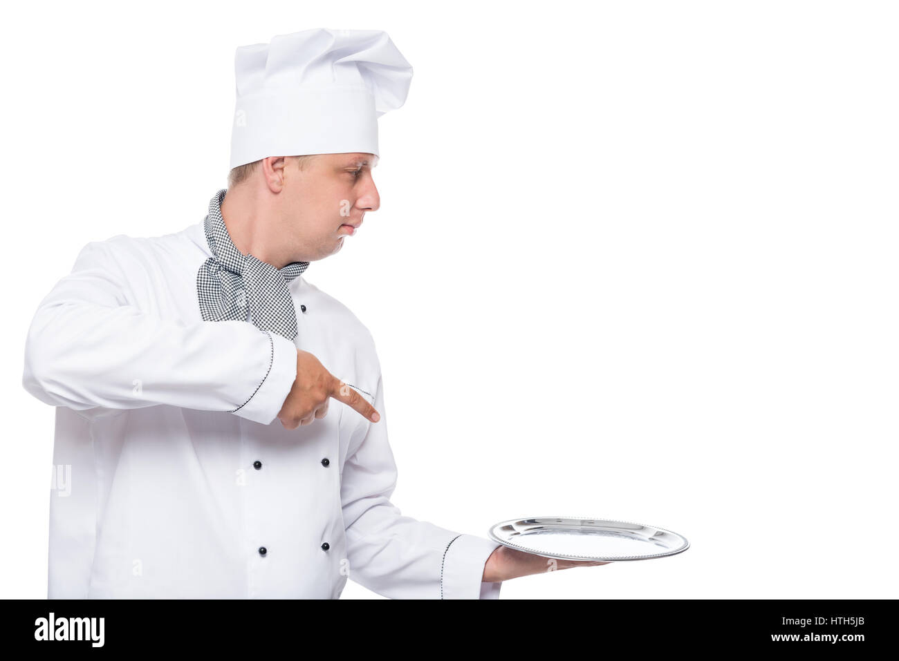 Chef with a blank space on the right and a tray on a white background ...