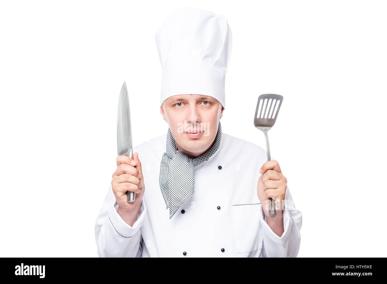 portrait of ready Chef with shovel and a sharp knife on a white ...